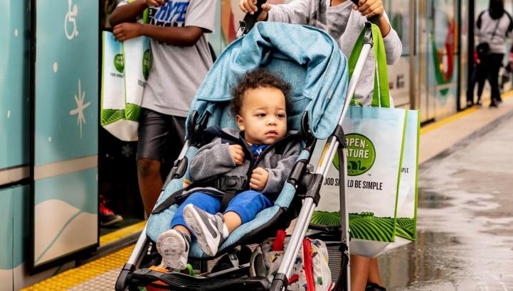 Photo of child in stroller.