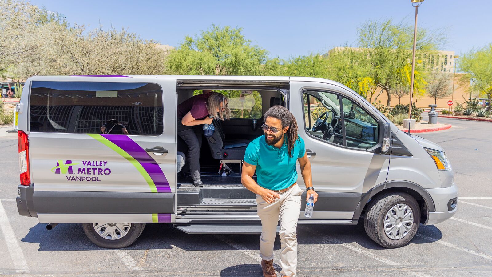 Happy people leaving vanpool