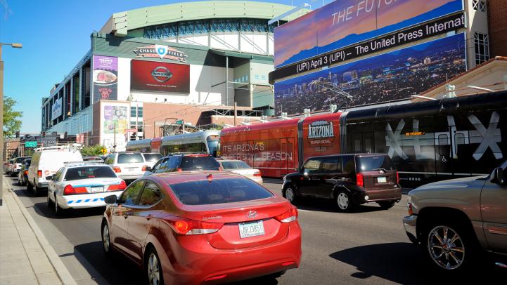 Cars next to Valley Metro Rail